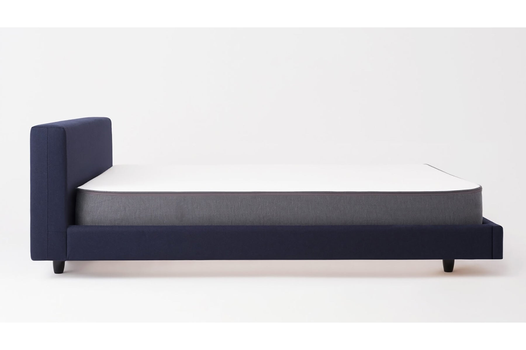 Bento upholstered bed by EQ3 at Five Elements Furniture