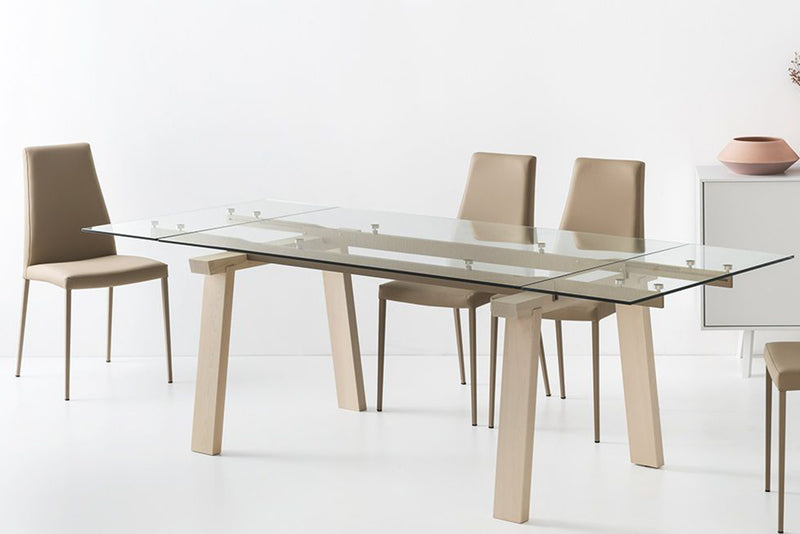 The customizable Levante extendable table made by Calligaris. - Five ...
