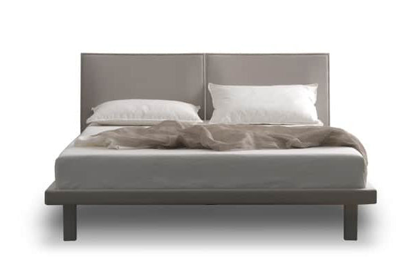 A made to order fully upholstered modern bed with sled base option ...